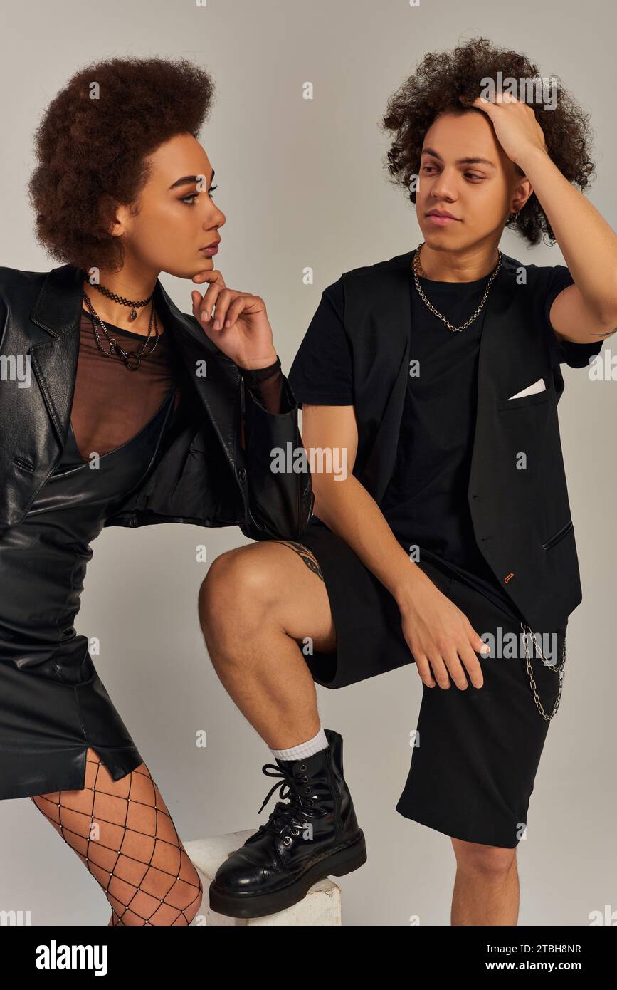 attractive african american siblings in stylish black urban attire ...