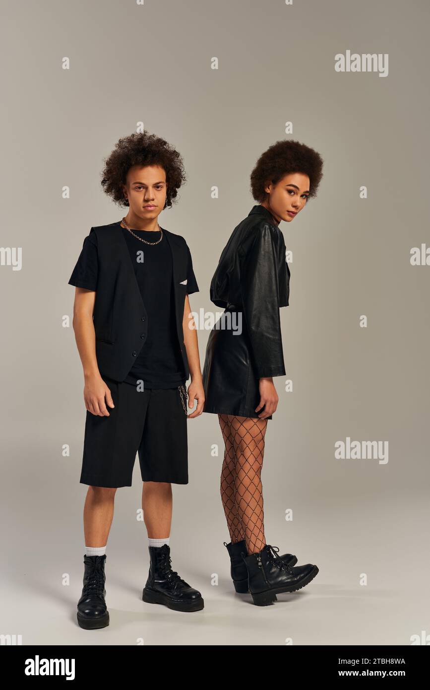 attractive stylish african american siblings in fashionable black ...