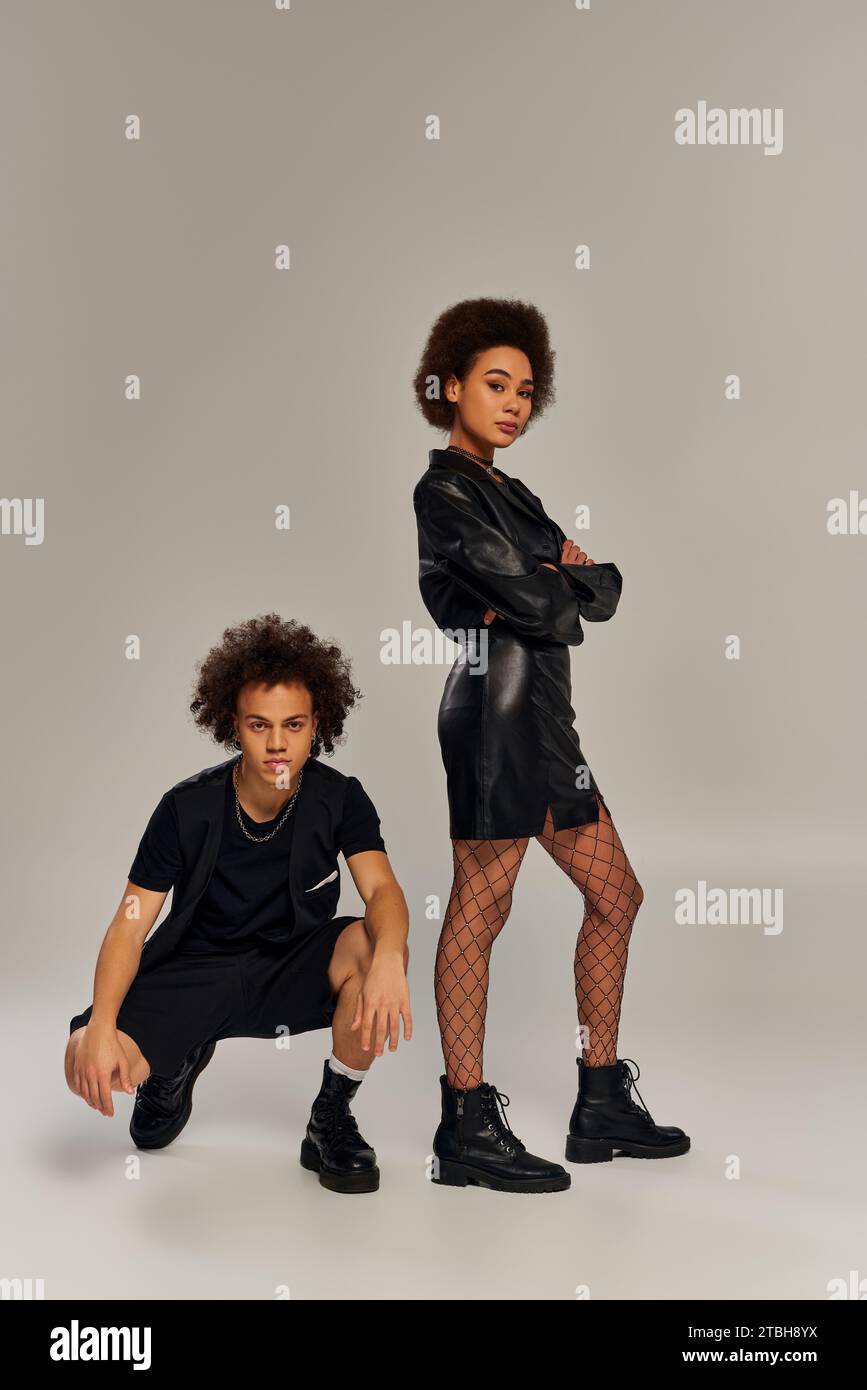 attractive stylish african american siblings in fashionable black ...