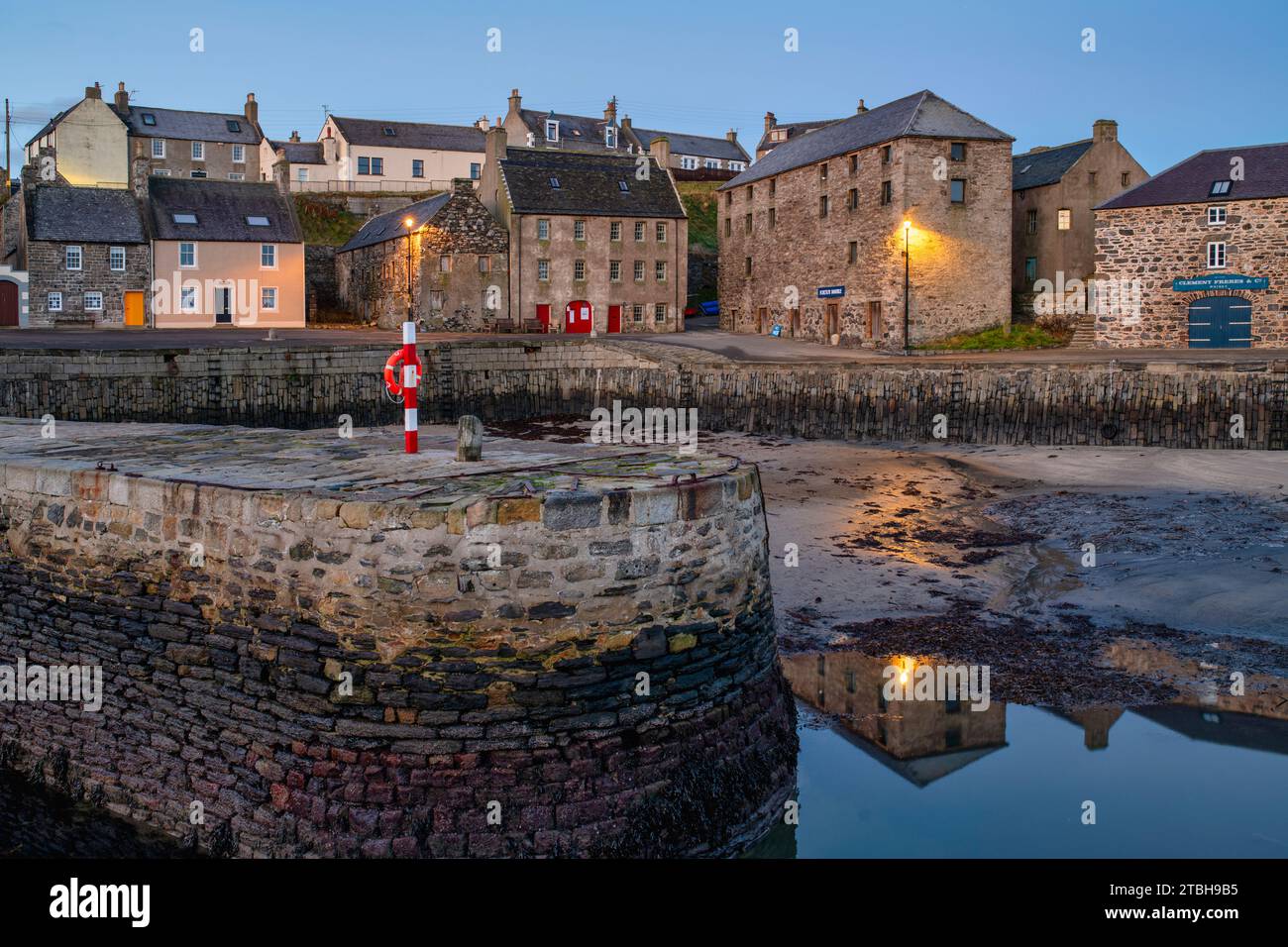 Portsoy historic harbour after dawn at low tide. Aberdeenshire ...
