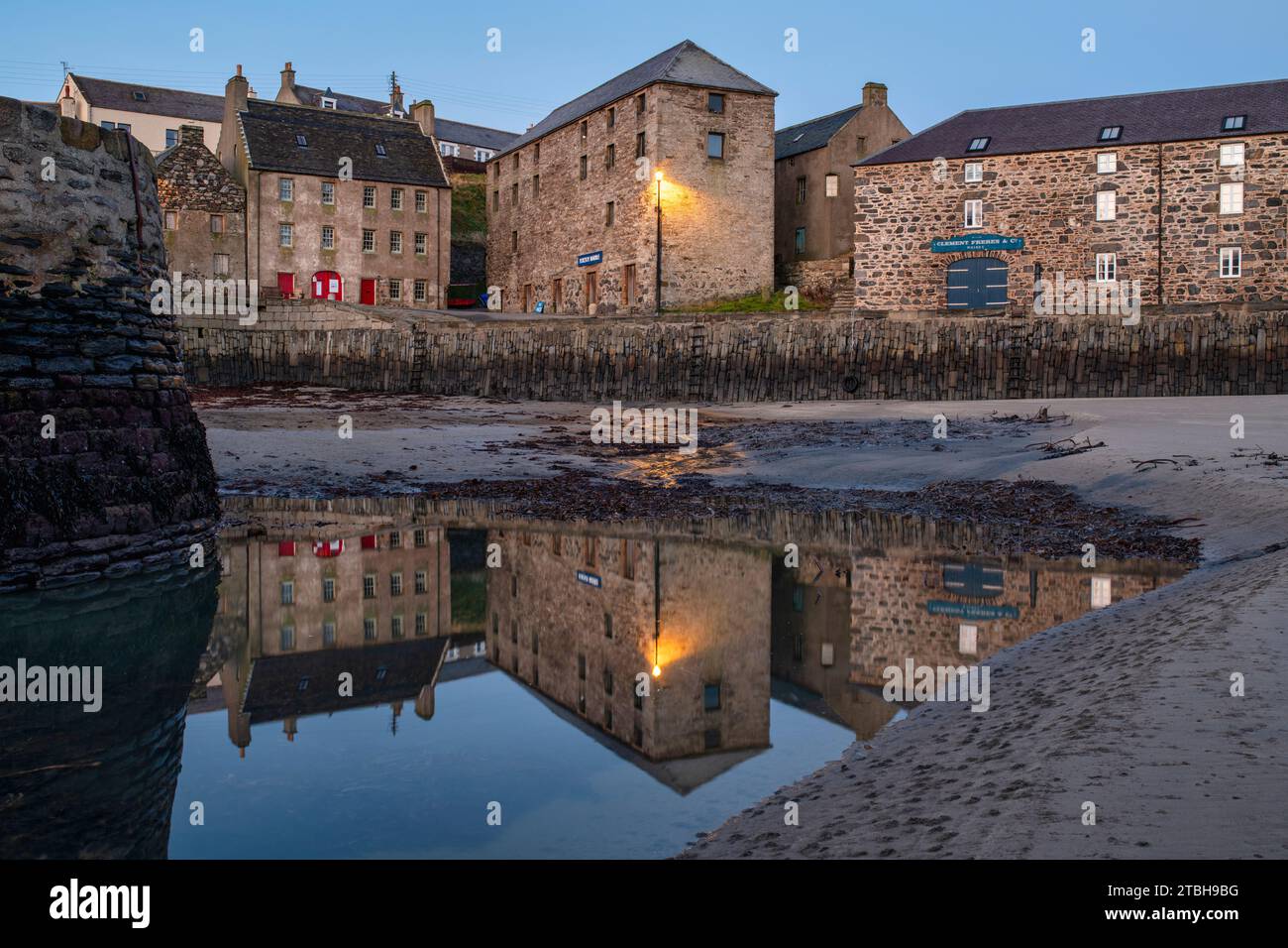 Portsoy historic harbour after dawn at low tide. Aberdeenshire ...