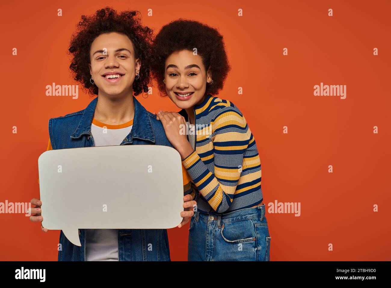 emotional caring african american brother and sister posing with speech ...