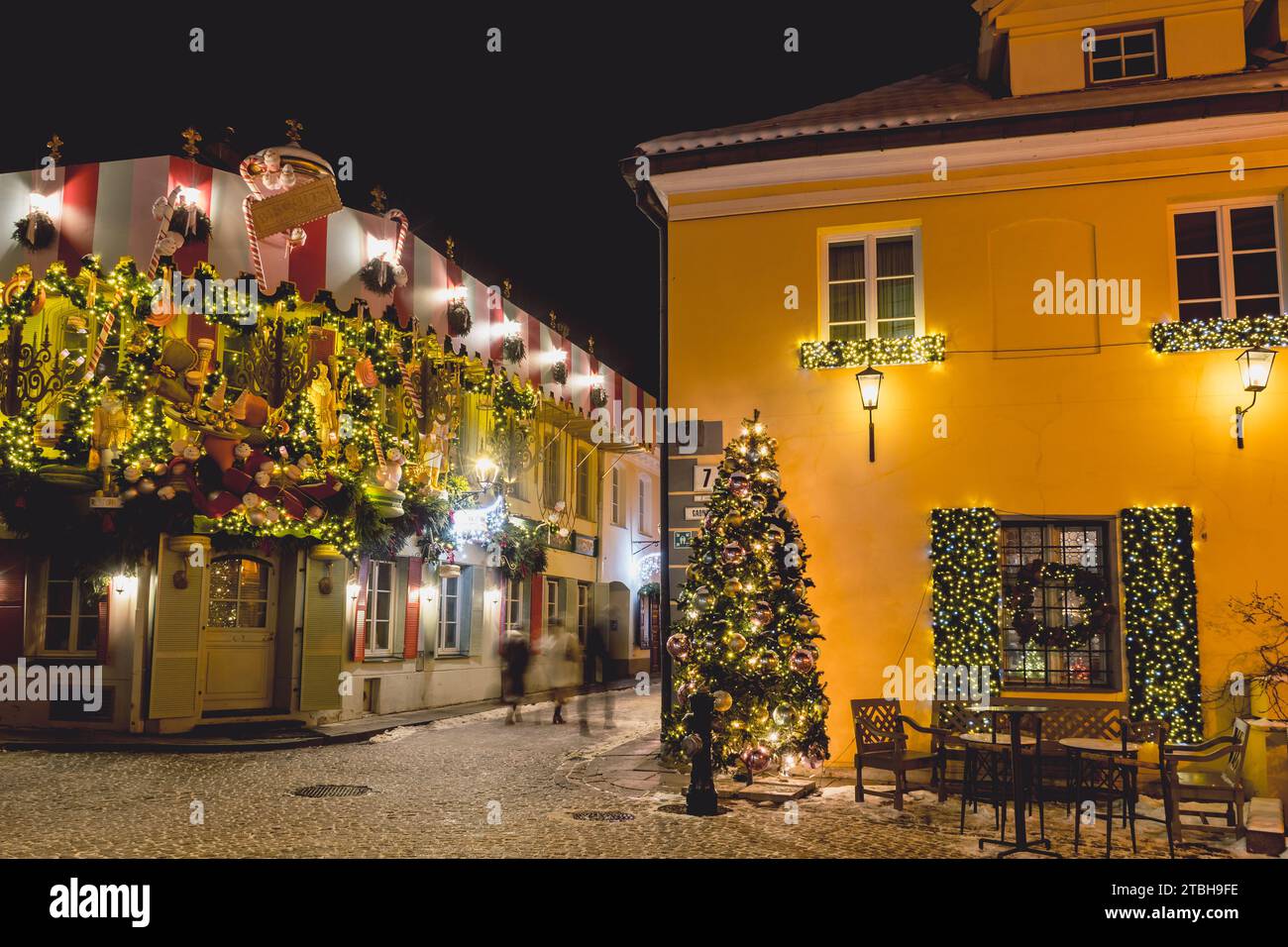 Beautiful cozy Christmas decorations, wreath, garlands and lights in ...