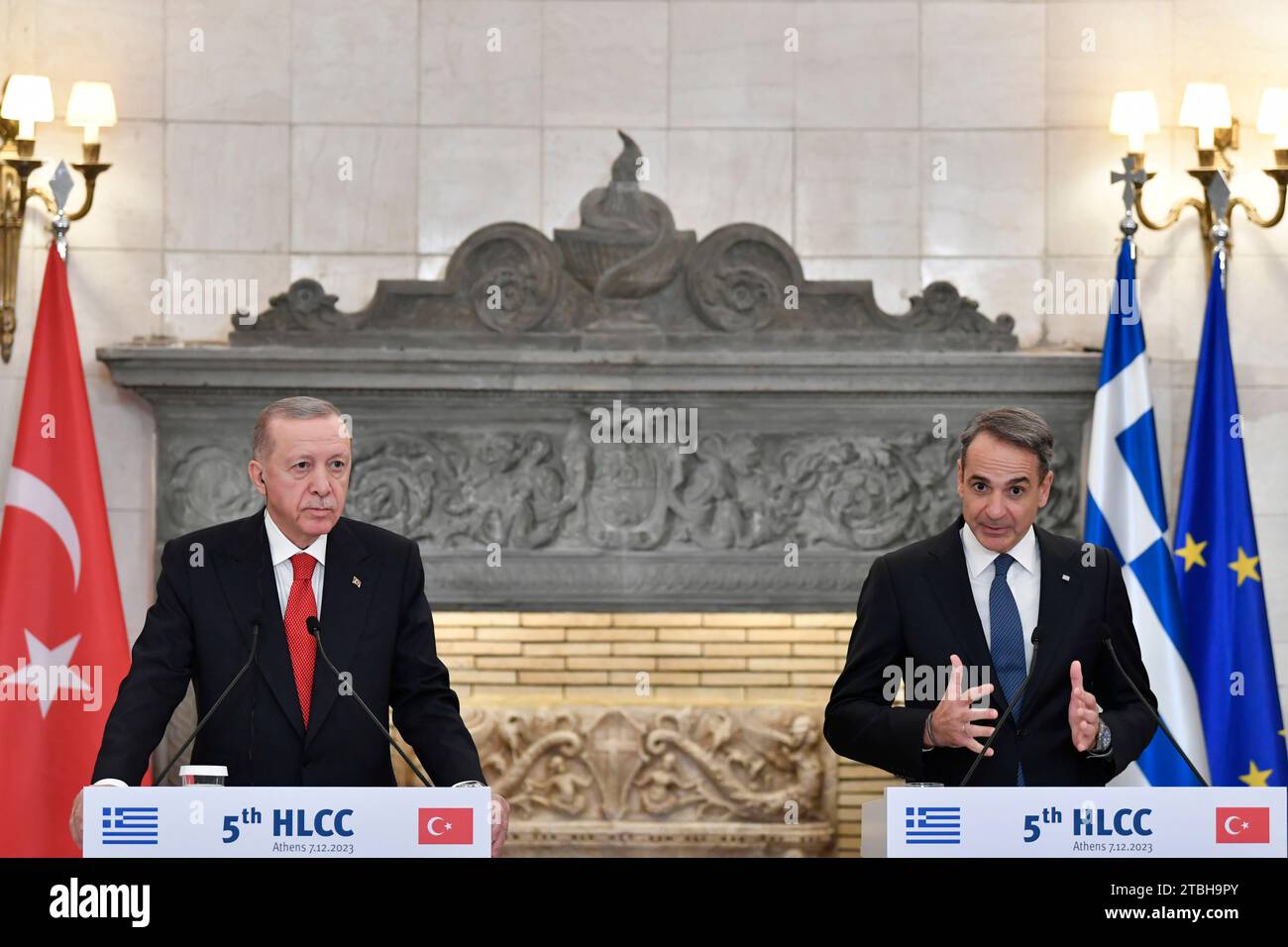 Greece's Prime Minister Kyriakos Mitsotakis, right, makes statements with Turkey's President ...