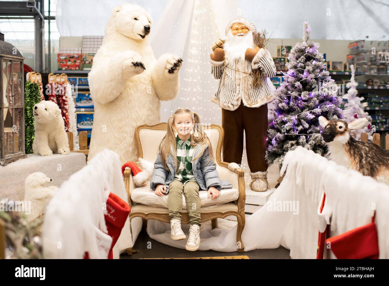 A girl visiting Santa Claus Stock Photo - Alamy