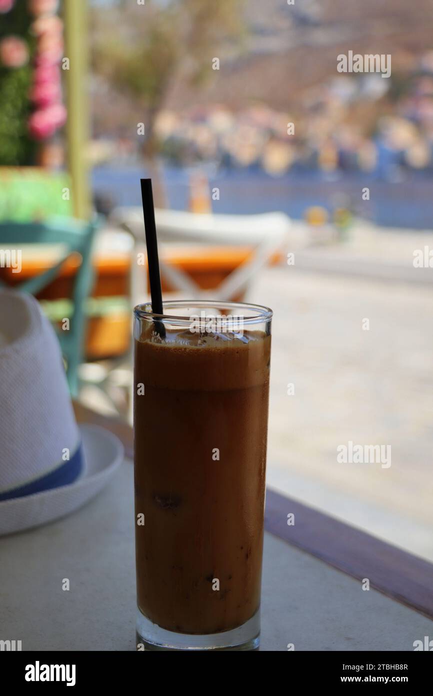 Traditional greek cold coffee Frappe with foam made from milk, instant ...