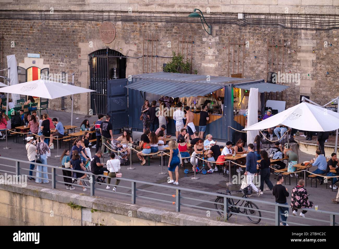 Paris, France - October 8, 2023 : View of a crowded outdoor bar ...