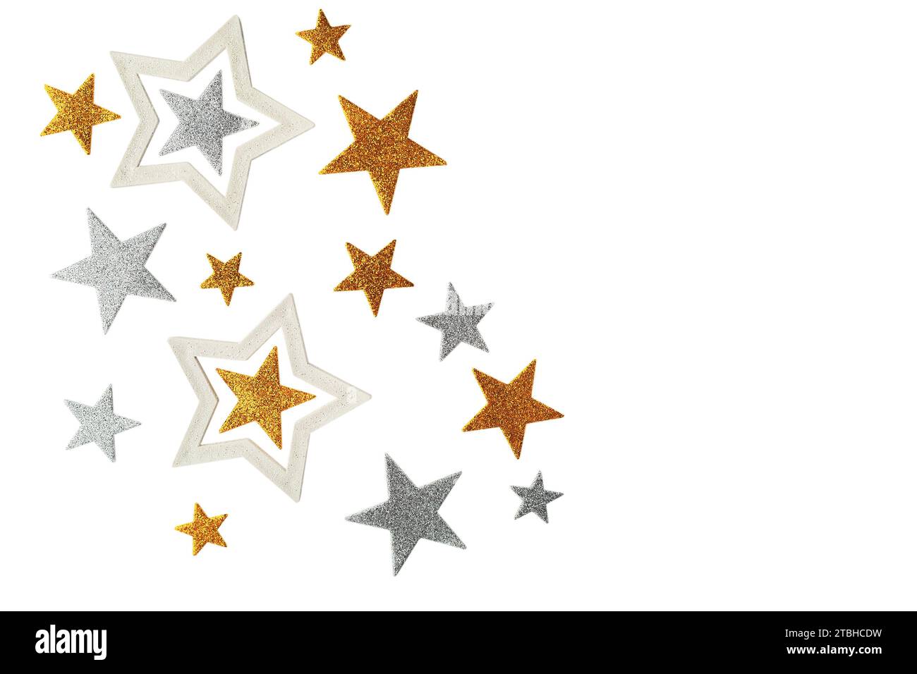 Beautiful Christmas background of many gold and silver stars on a white ...