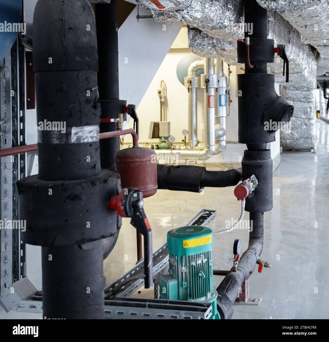 a technical room with exhaust system of a large building. Industrial ...