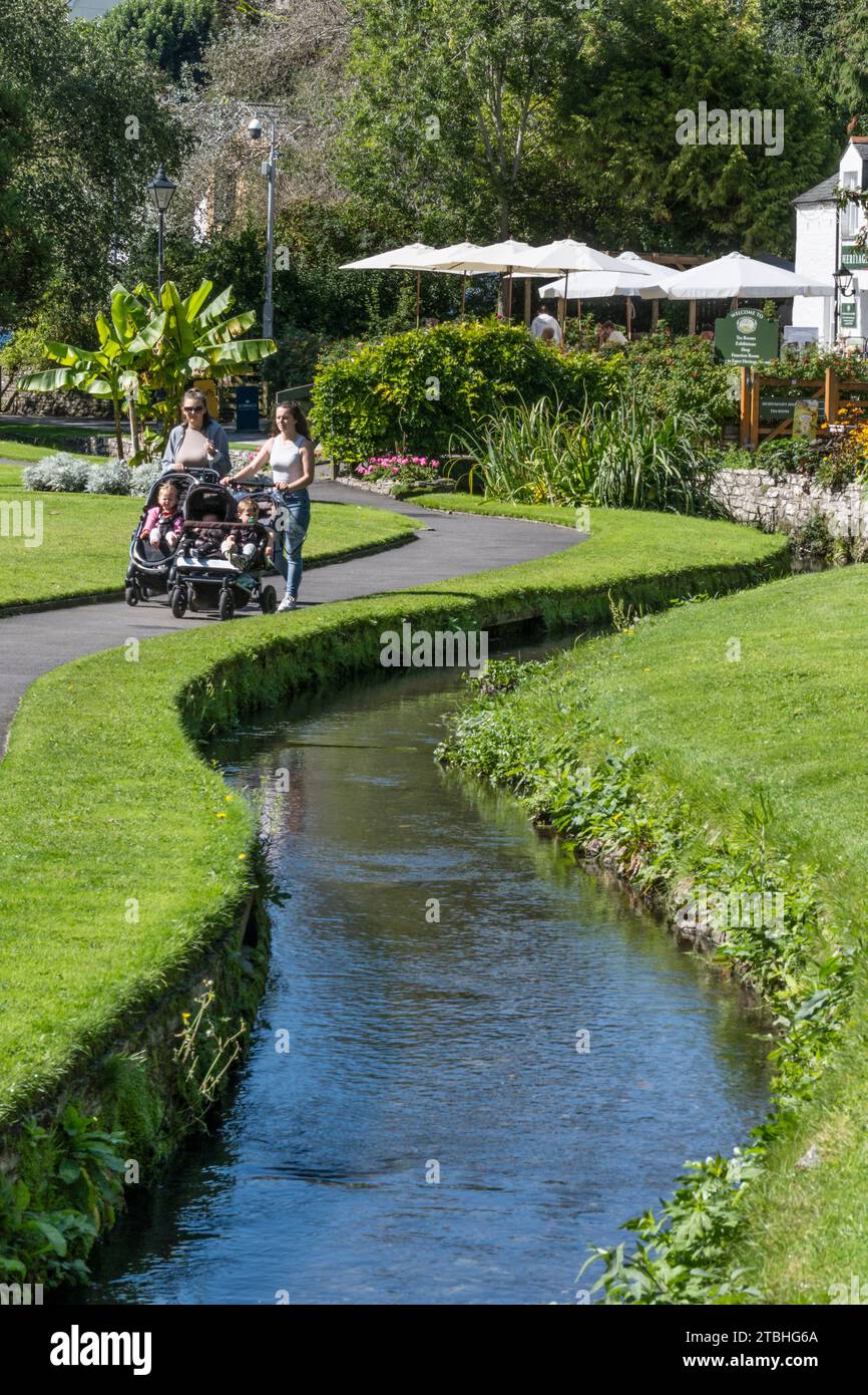 A small stream river flowing through the landscaped Trenance Gardens in ...