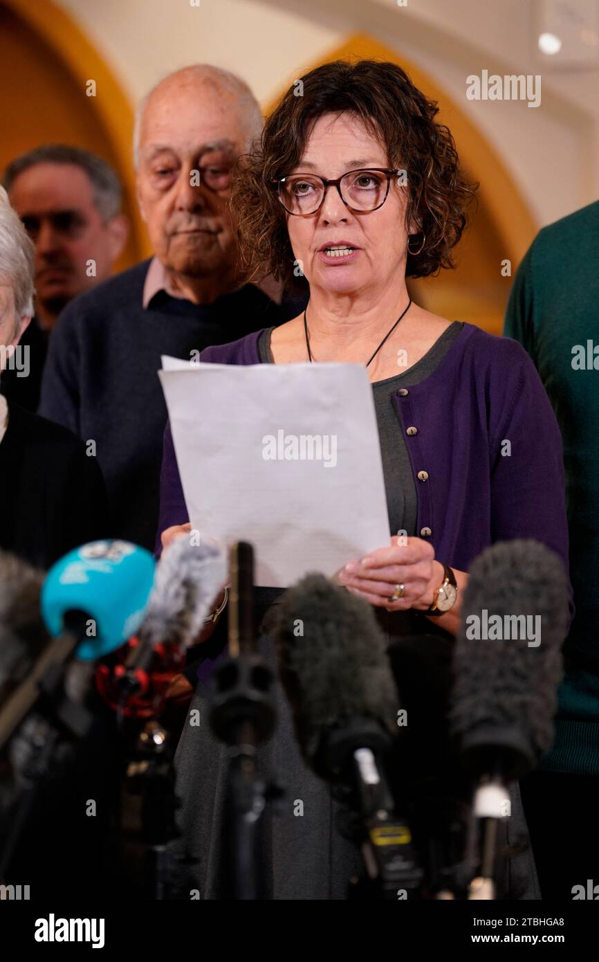 Julia Waters, sister of Ruth Perry, with other family members speaking ...