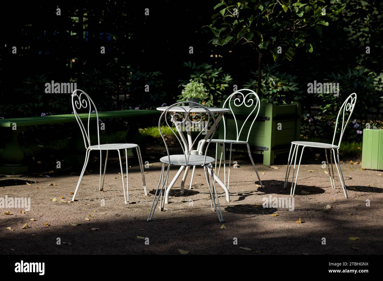 cozy european outdoor cafe with a table and chairs. summer open terrace ...