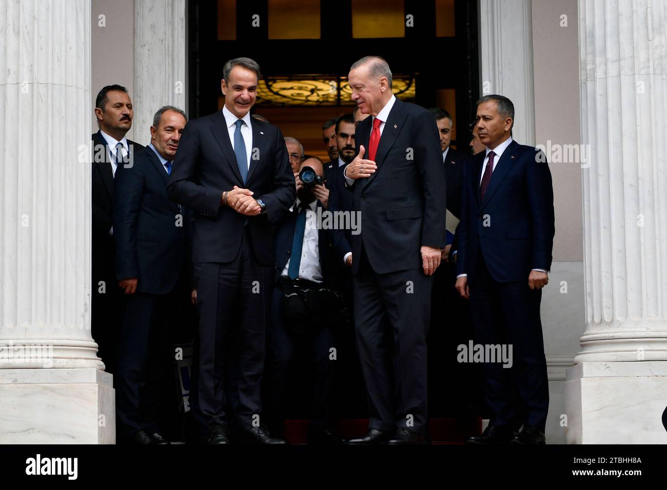 Turkey's President Recep Tayyip Erdogan, right, leaves after his ...