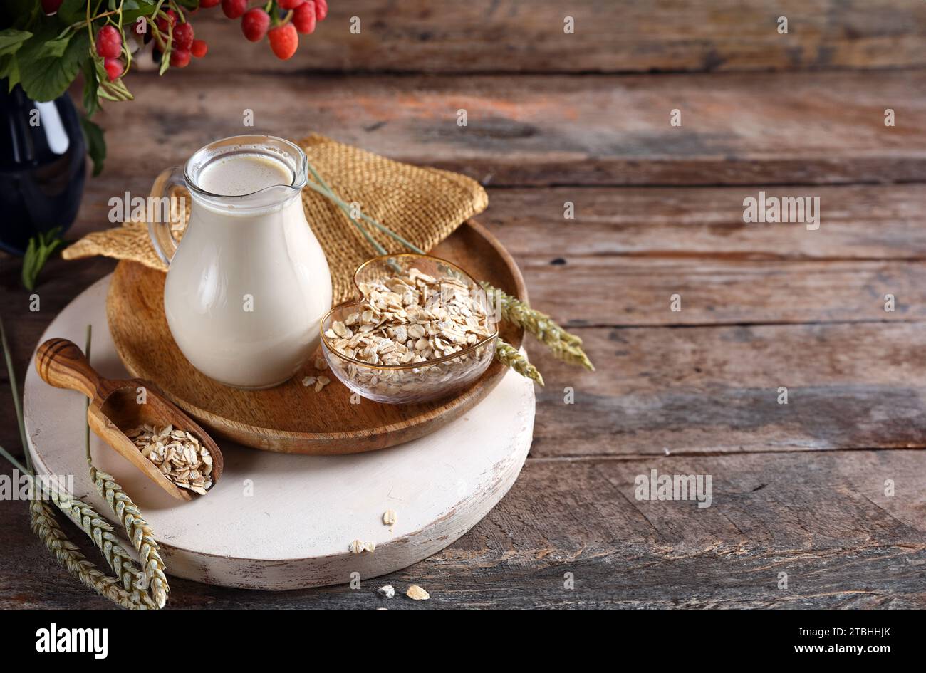 oat milk in a jug for healthy eating Stock Photo - Alamy