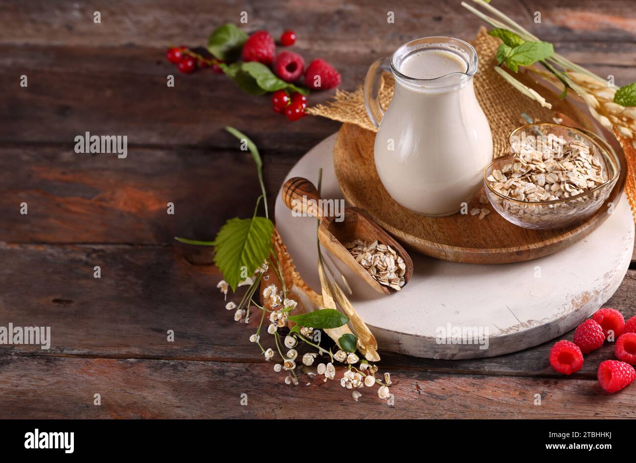 oat milk in a jug for healthy eating Stock Photo - Alamy