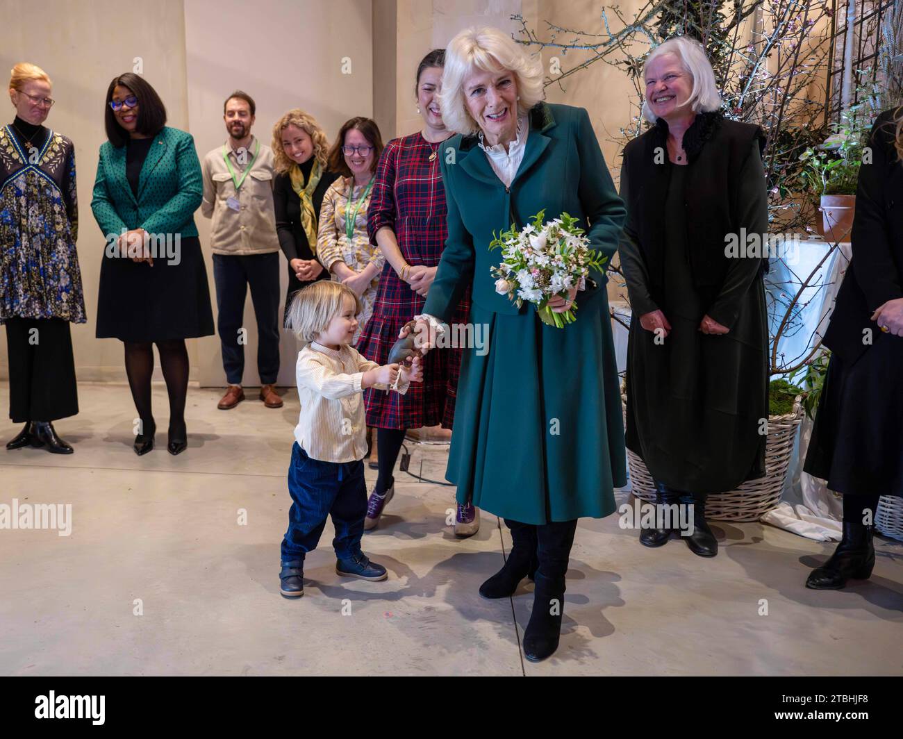 Queen Camilla meets Max Woodward, age 3, as she opens Winter Flowers ...