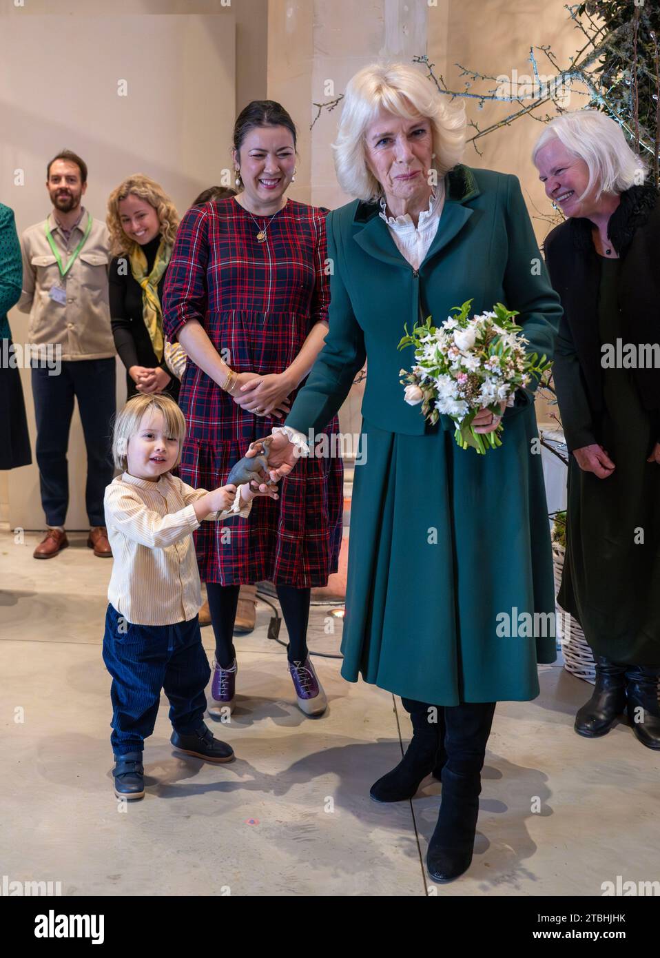 Queen Camilla meets Max Woodward, age 3, as she opens Winter Flowers ...