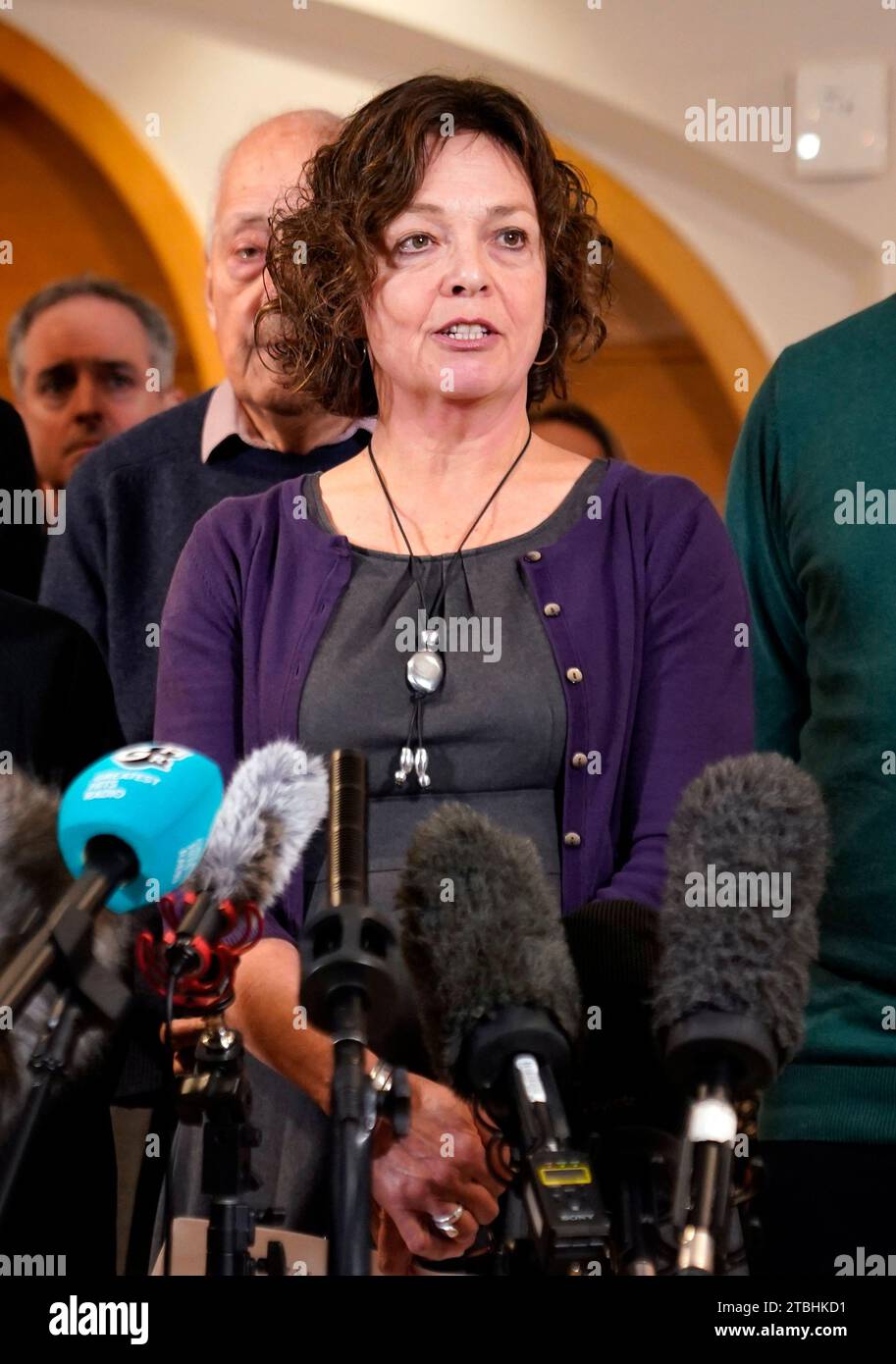 Julia Waters, sister of Ruth Perry, speaking to members of the media in ...
