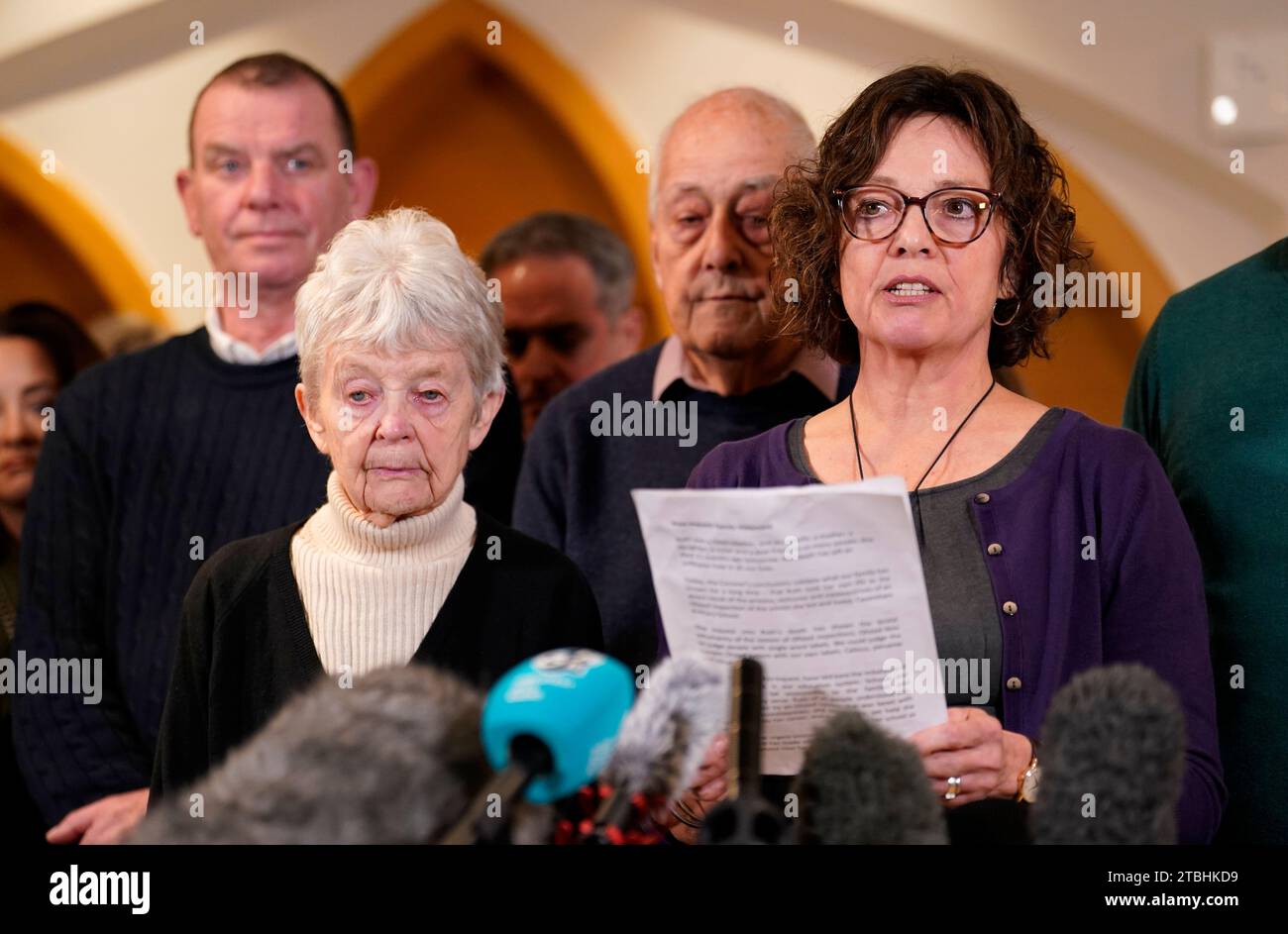 Julia Waters, sister of Ruth Perry, speaking to members of the media in ...