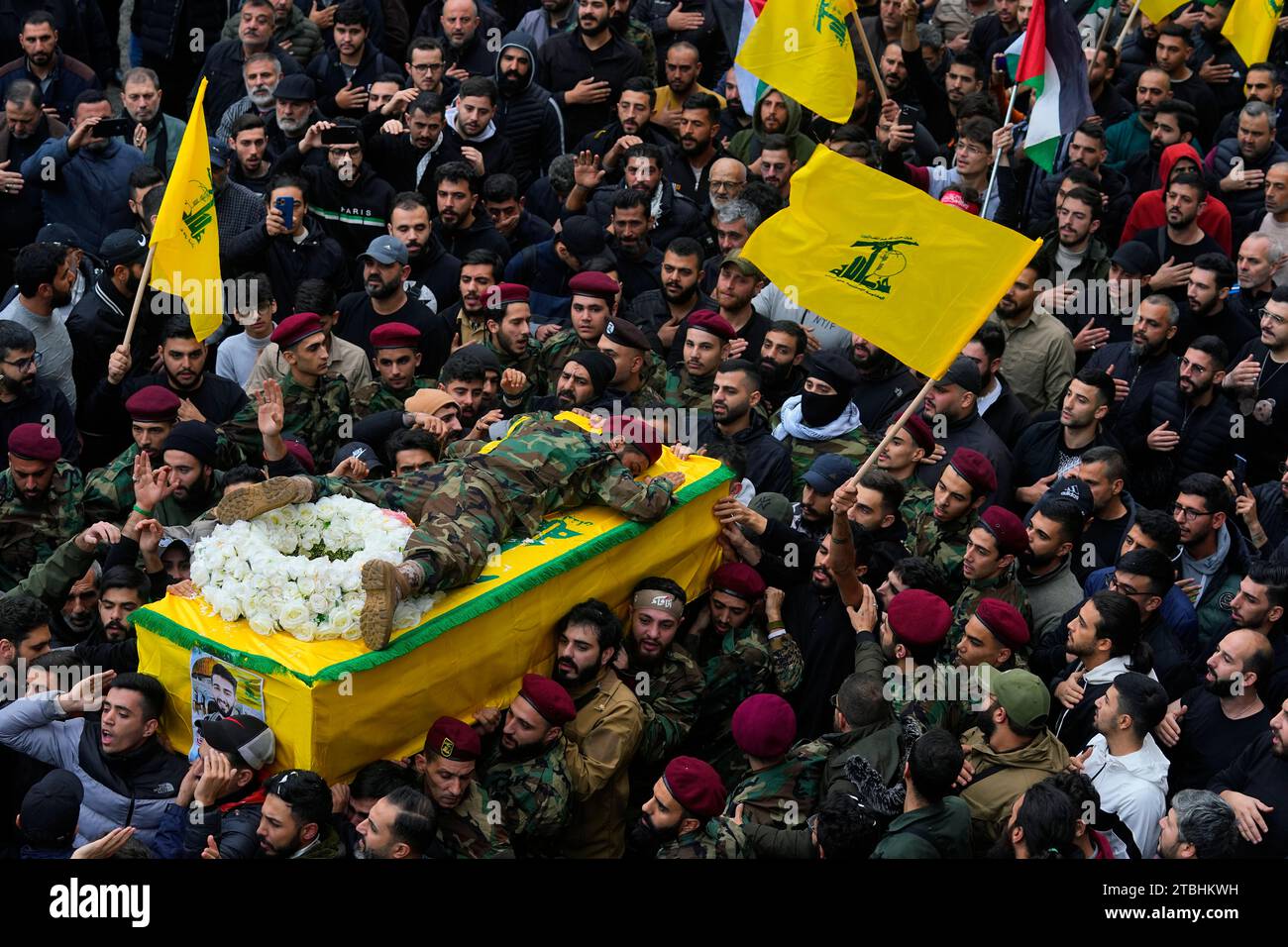 Hussein, brother of Hezbollah fighter Ali Hassan al-Atat, who was ...