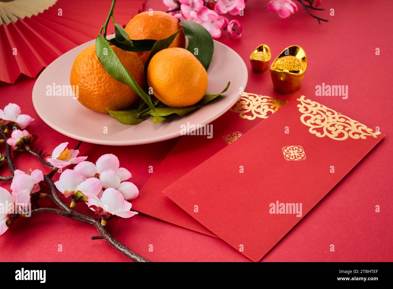 Chinese New Year. Red packet envelope, flowers, mandarins, festival ...