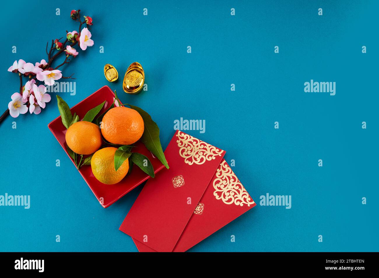 Chinese New Year. Red packet envelope, flowers, mandarins, festival ...