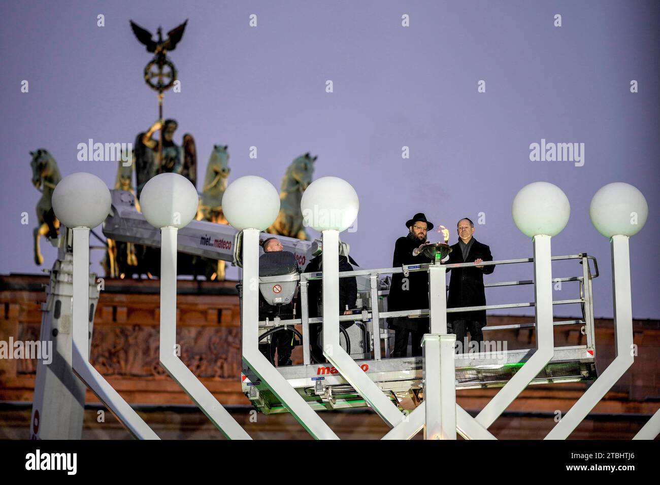 German Chancellor Olaf Scholz, right, and Rabbi Yehuda Teichtal attend ...