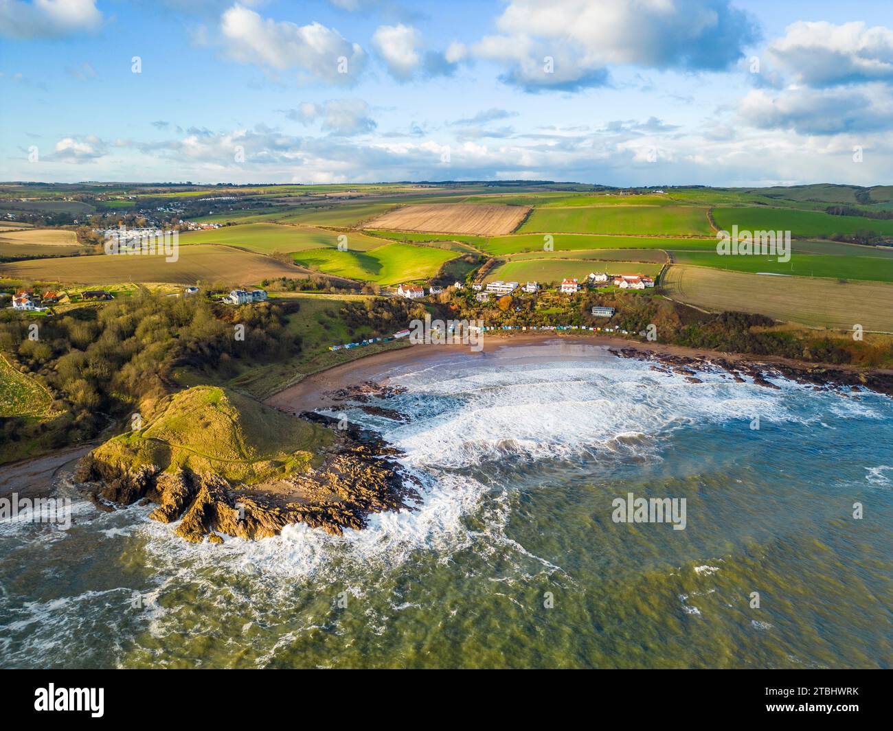Aerial view of beach in Coldingham Bay in Scottish Borders, Scotland ...