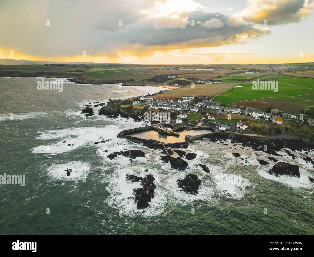 Aerial view in winter of St Abbs village and harbour in Scottish ...