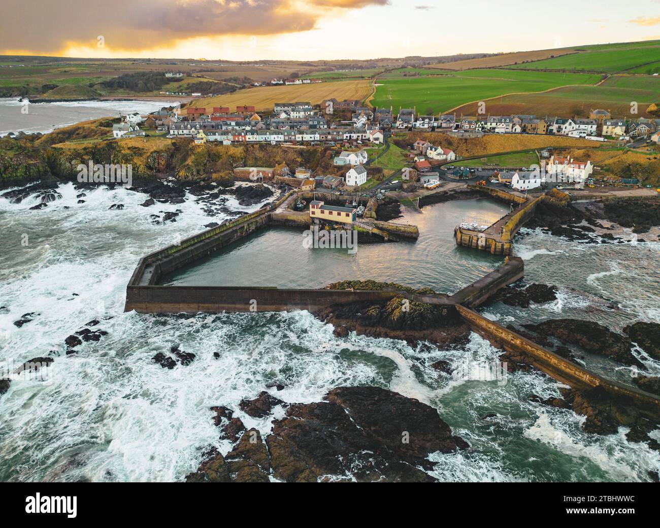 Aerial view of St Abbs village and harbour in Scottish Borders ...