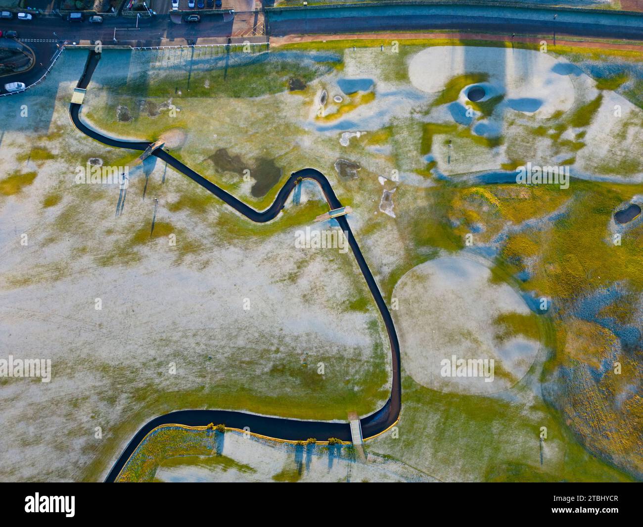Aerial view of frost covered 1st and 18th fairway and Swilcan Burn and ...