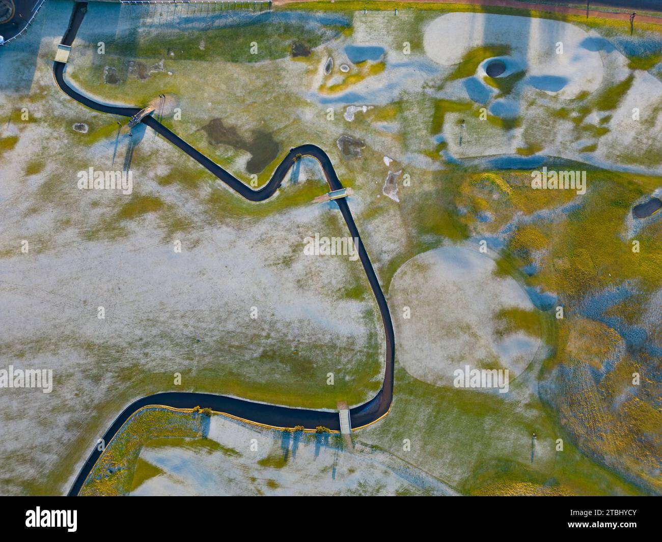 Aerial view of frost covered 18th fairway and Swilcan Burn and Bridge ...