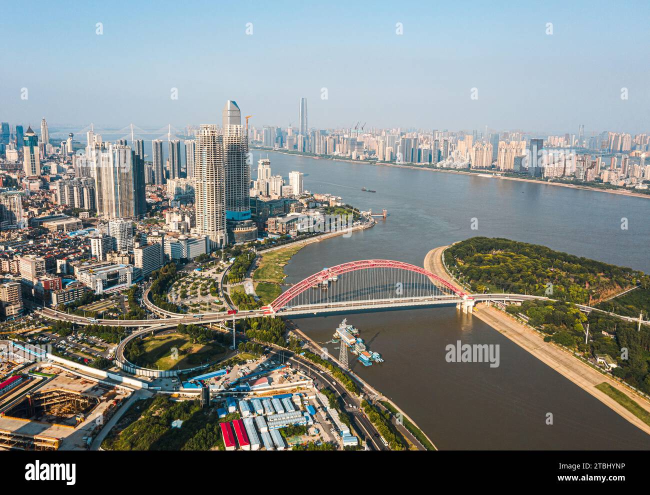 An aerial bird's eye view of a skyline on both sides of the Yangtze ...