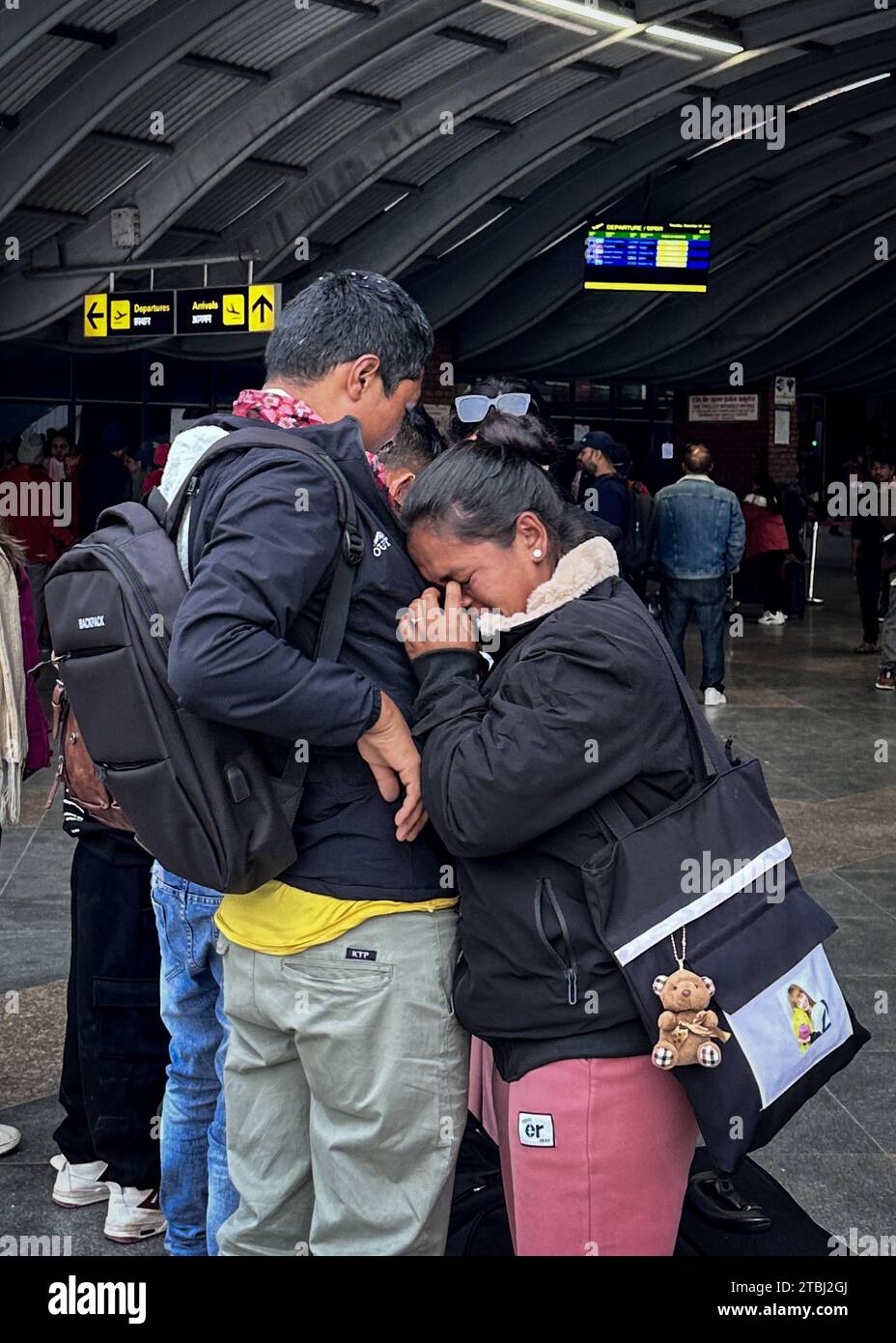 December 7, 2023: A Nepali family is seen at Tribhuwan International ...