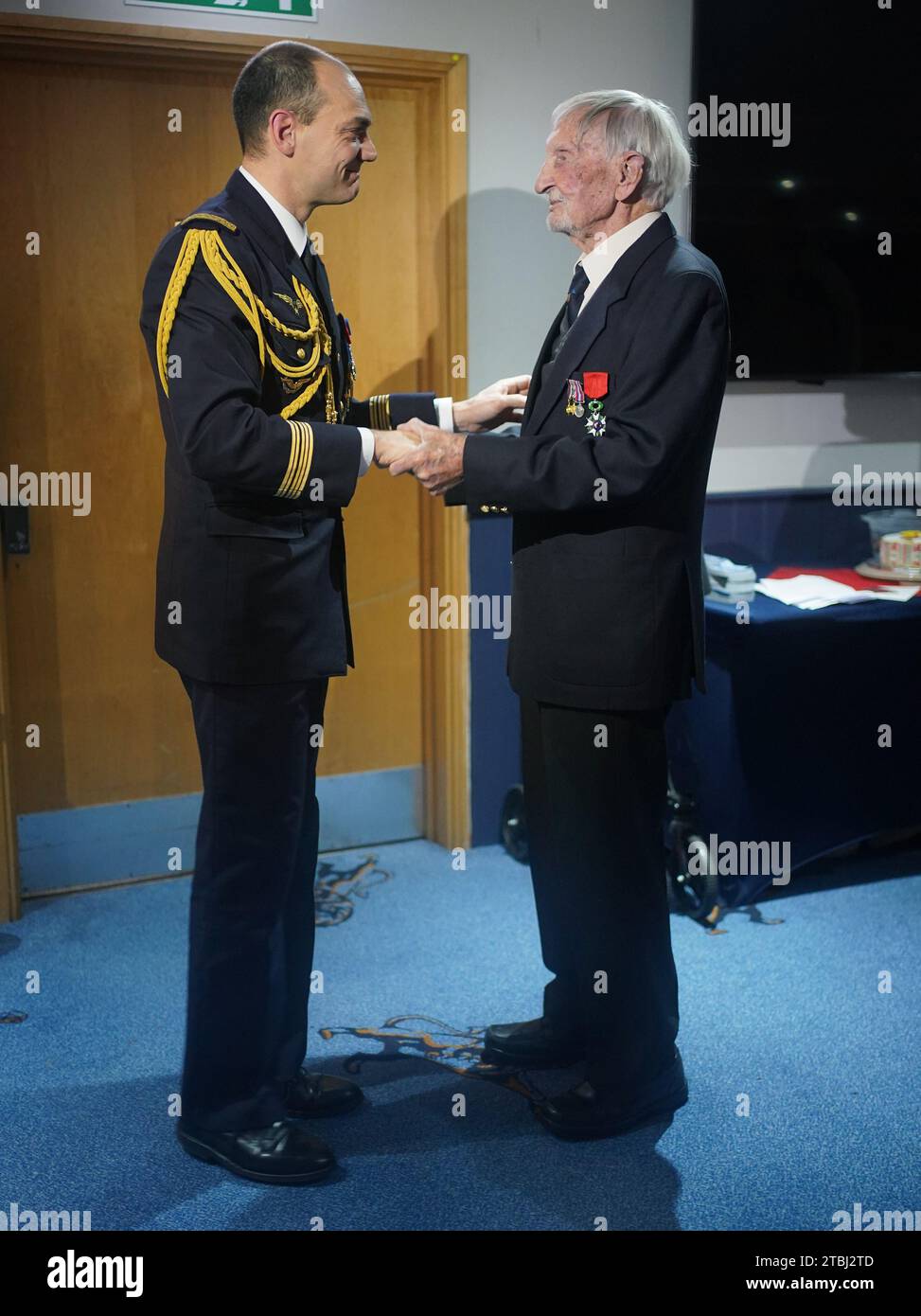 French Colonel Xavier Ravel (left) surprises 100-year-old WW II veteran ...