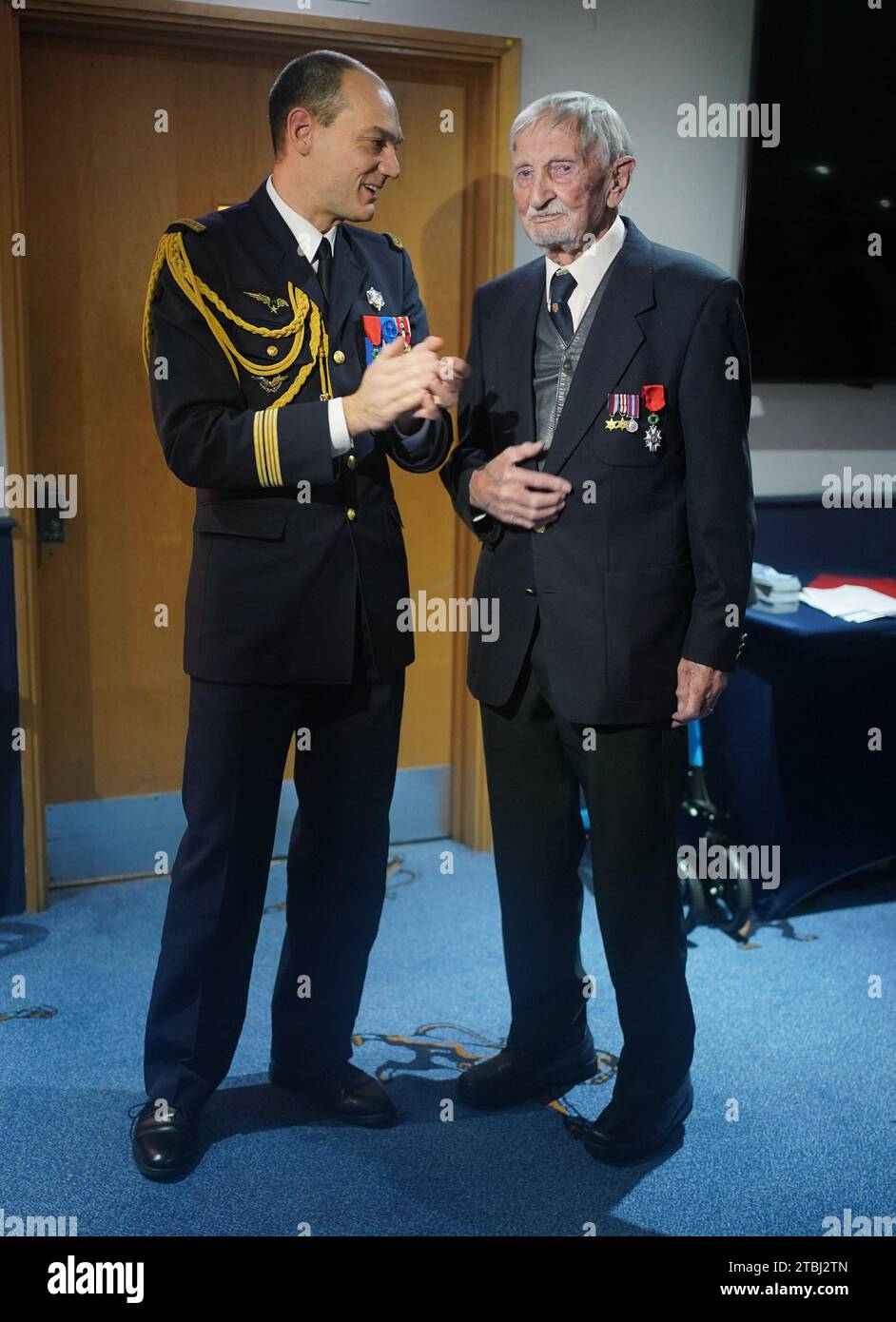 French Colonel Xavier Ravel (left) surprises 100-year-old WW II veteran ...