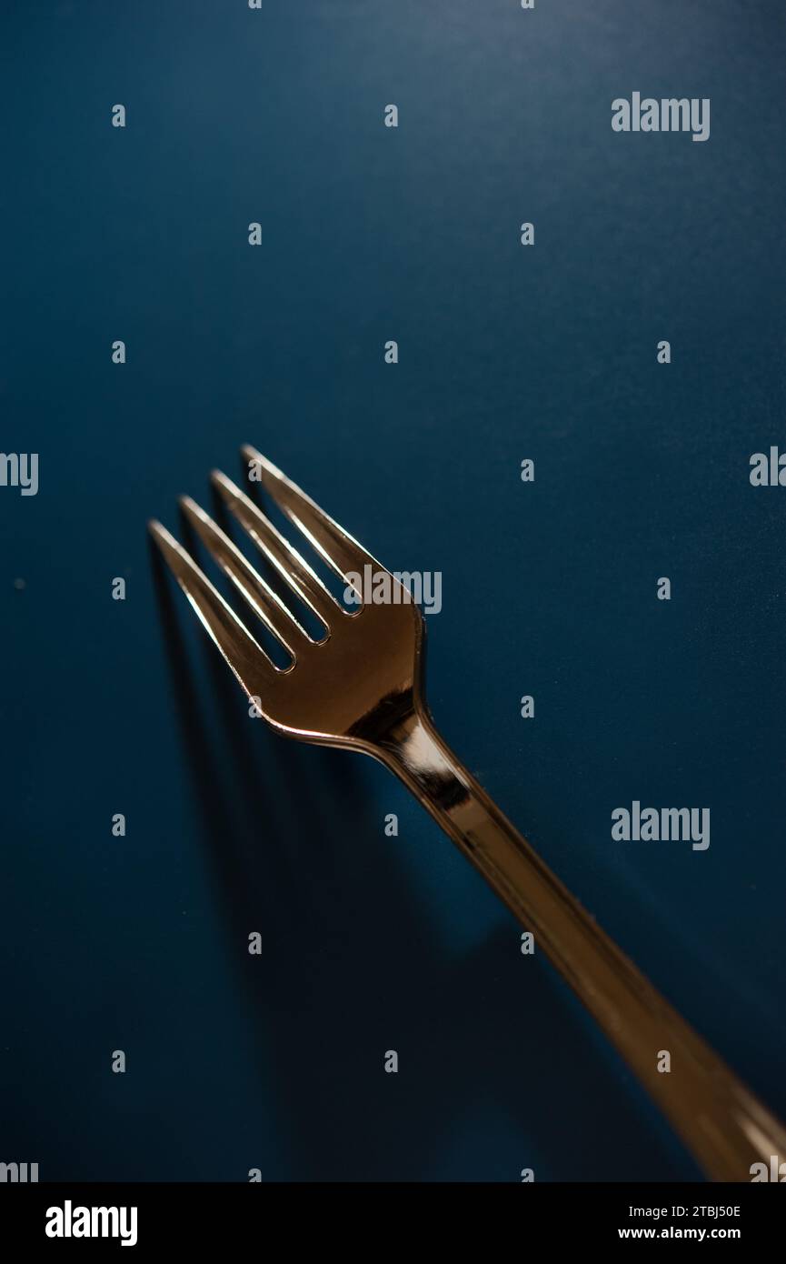 studio still life of a fork in dark setting and dramatic light Stock ...