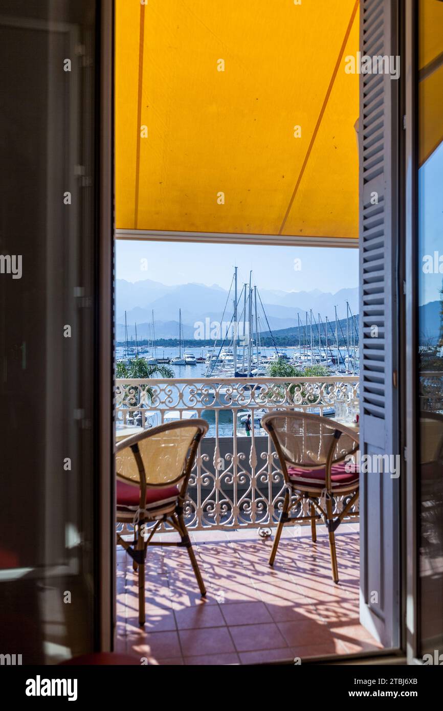 View of the Calvi Marina from inside a restaurant. Calvi, Corsica ...