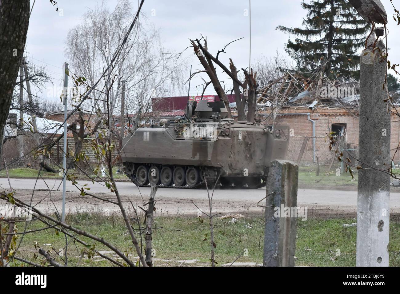 An armored Ukrainian military vehicle seen passing on the road along ...