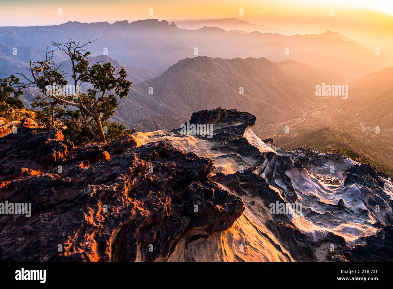 Colorful landscape background at sunrise in the Asir Mountains in Saudi ...