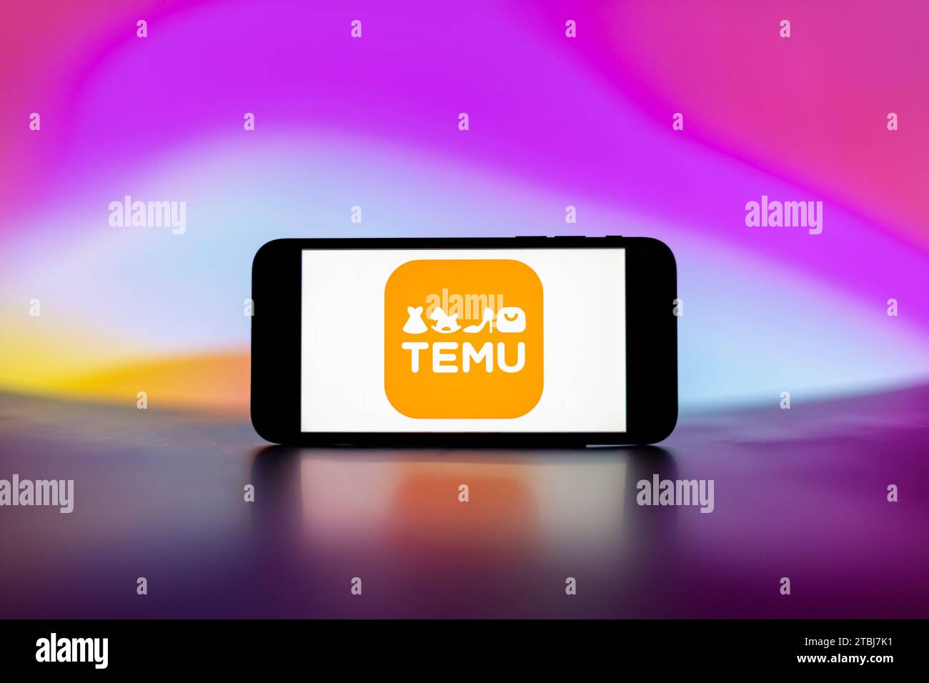 In this photo illustration, the Temu logo is seen displayed on a mobile ...