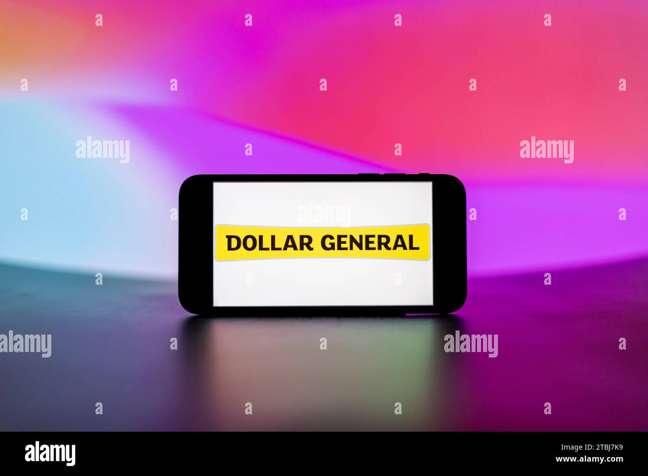 In this photo illustration, the Dollar General logo is seen displayed ...