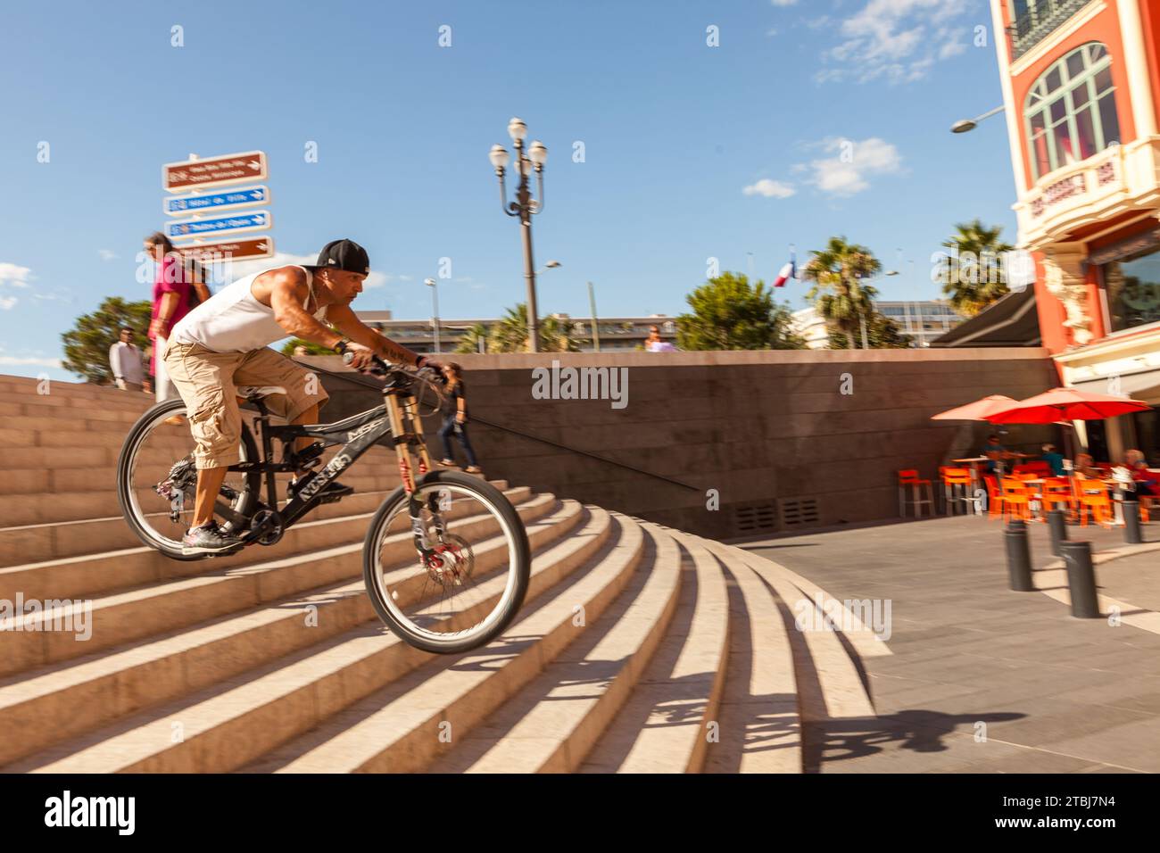 Cyclist performing acrobatic jumps, Place Masséna, Nice, France Stock ...