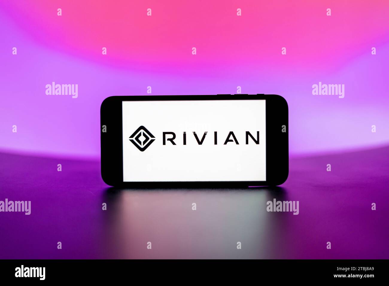 India. 07th Dec, 2023. In this photo illustration, the RIVIAN logo is ...