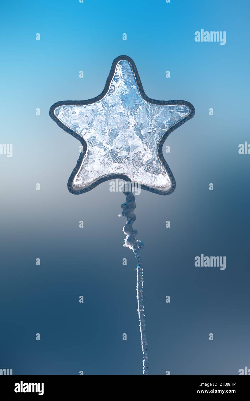 concept winter, frost. beautiful frosty patterns on a star shape, soap ...
