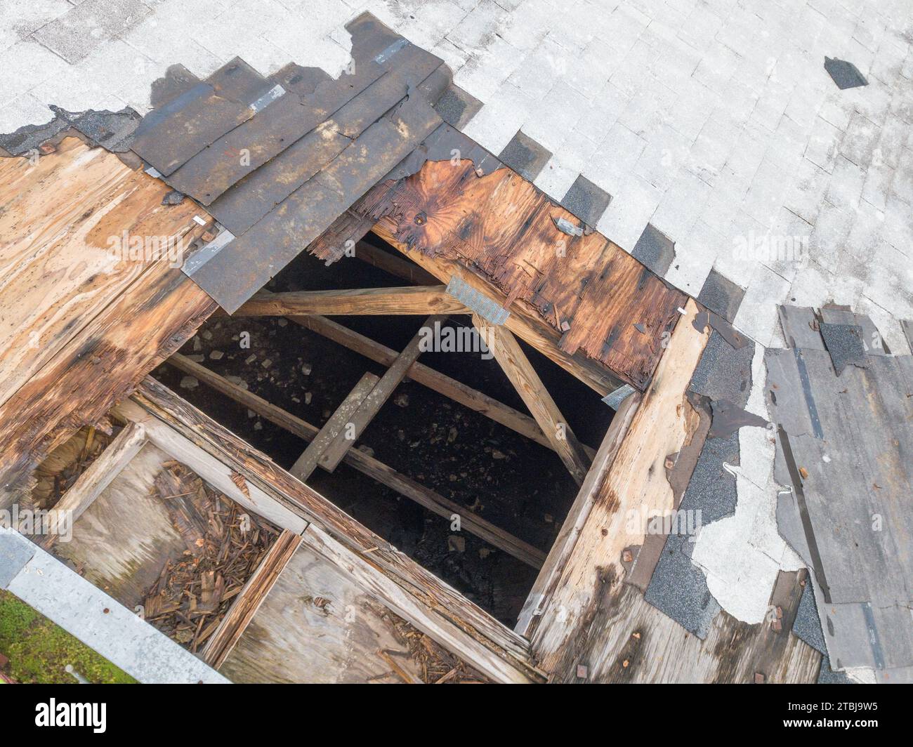 Drone photos of an old roof in need of replacement during an inspection ...