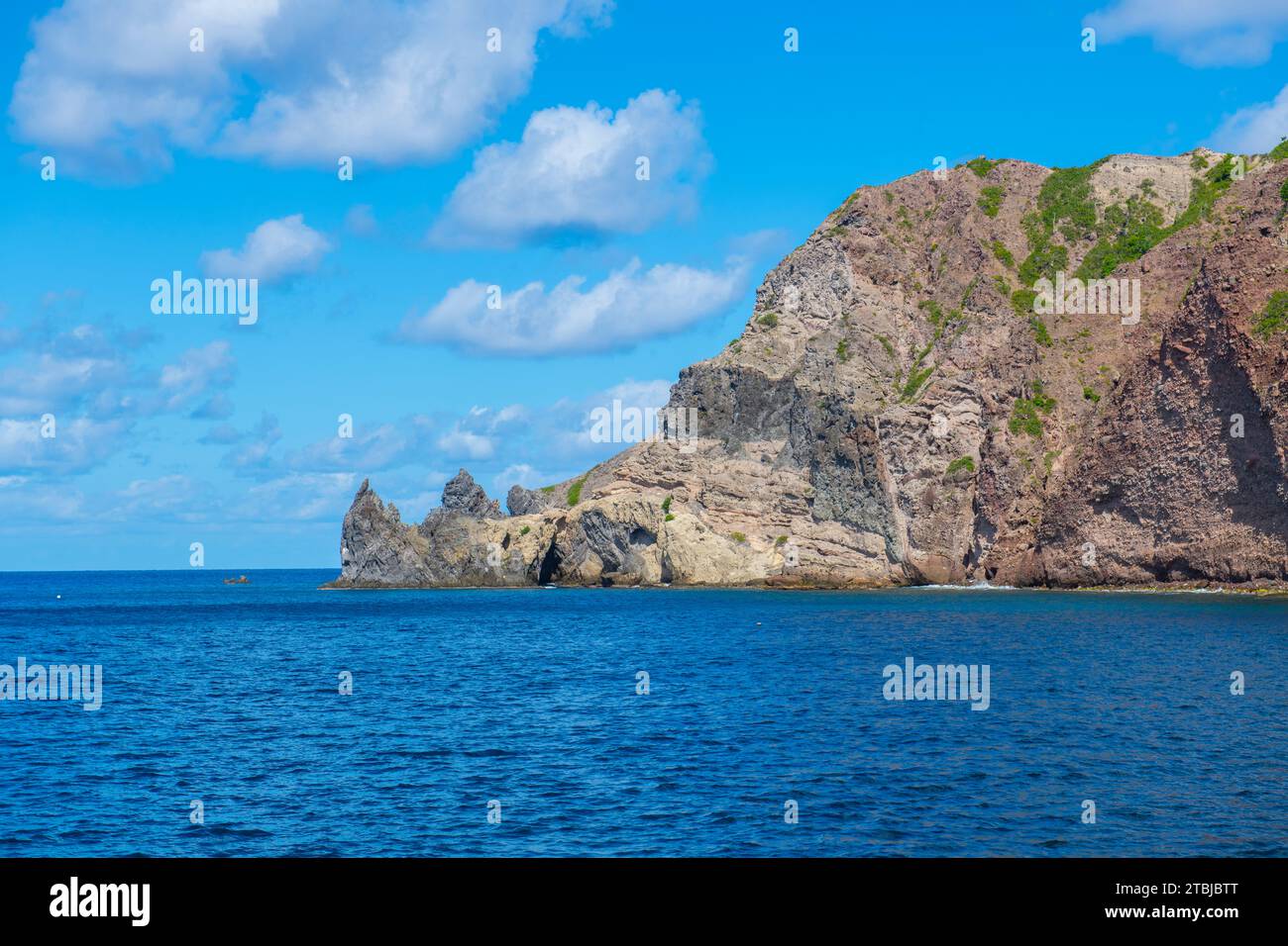 Well's Bay Beach with Cape Rhino at the end of the cliff on island of ...