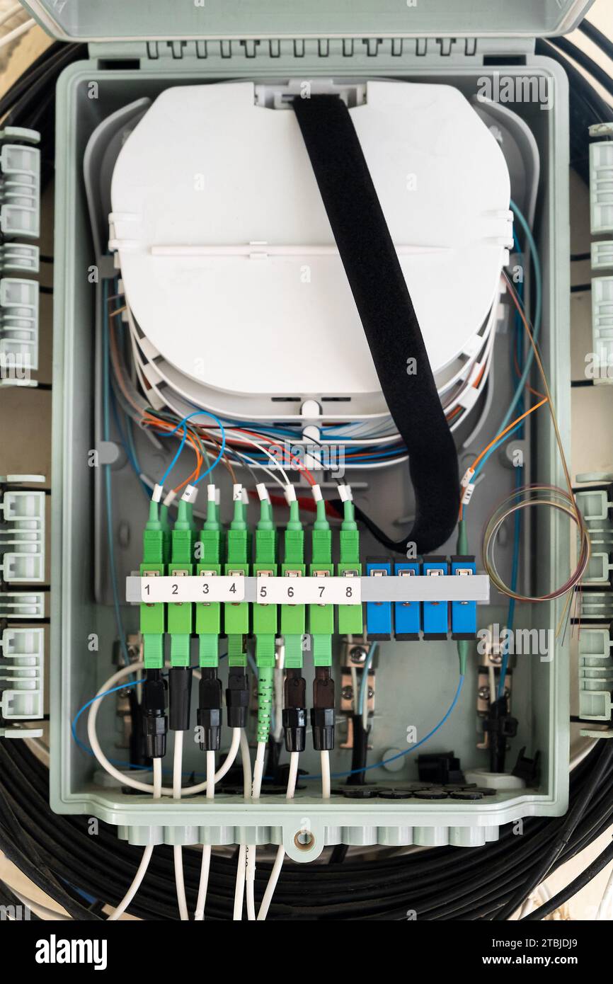 Fiber Optical cables connected to high-speed ports. a hub box for ...