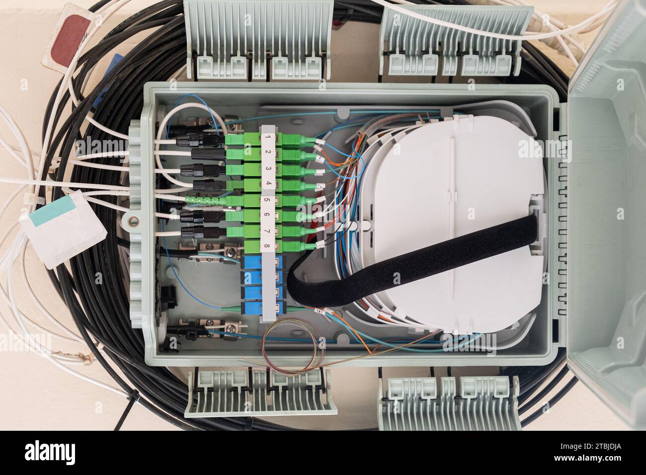 Fiber Optical cables connected to high-speed ports. a hub box for ...