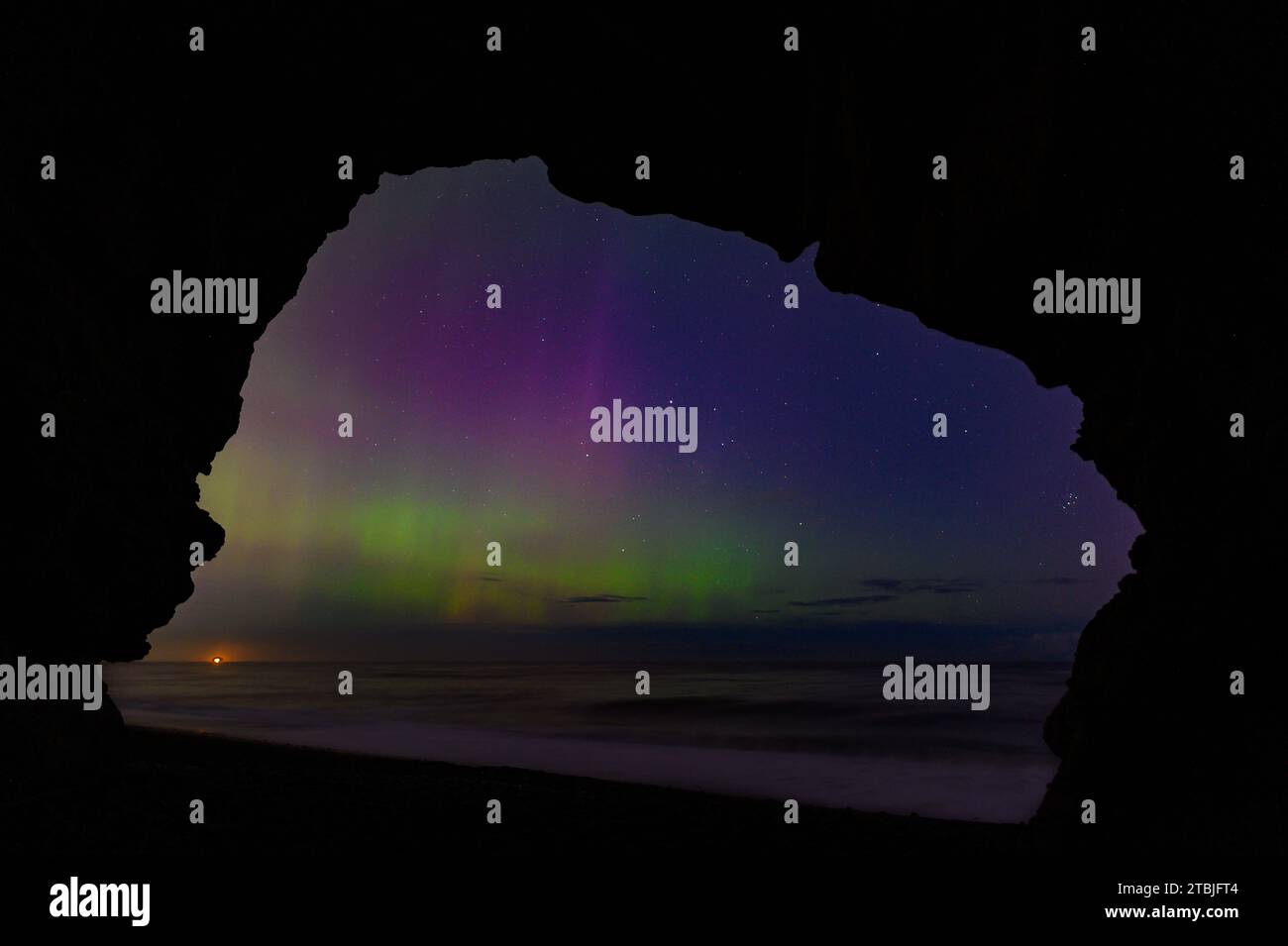 Aurora borealis and cave at Seaham beach, Durham Stock Photo - Alamy